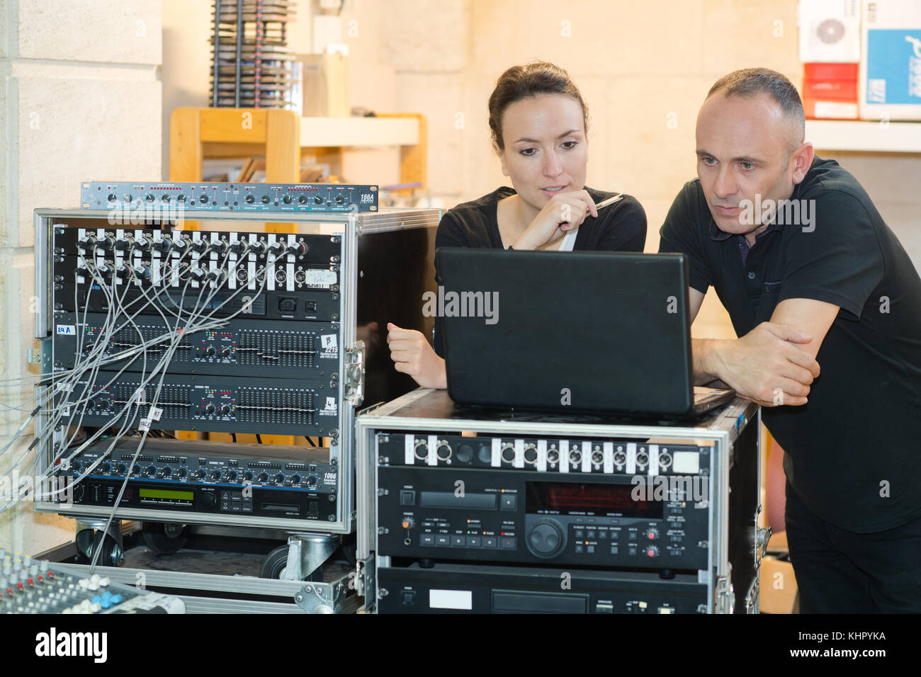 sound worker on a mixer board Stock Photo - Alamy