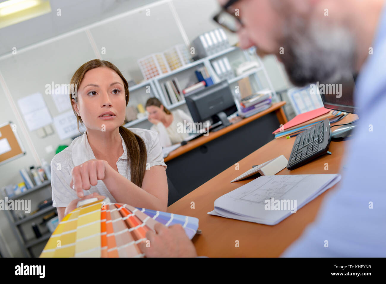 helping a customer choose Stock Photo - Alamy