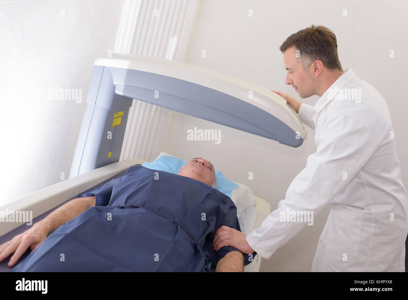 patient undergoing xray scan Stock Photo - Alamy
