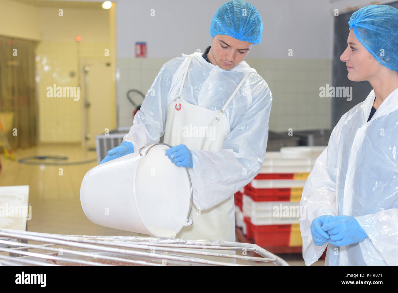 pouring additional ingredients Stock Photo - Alamy