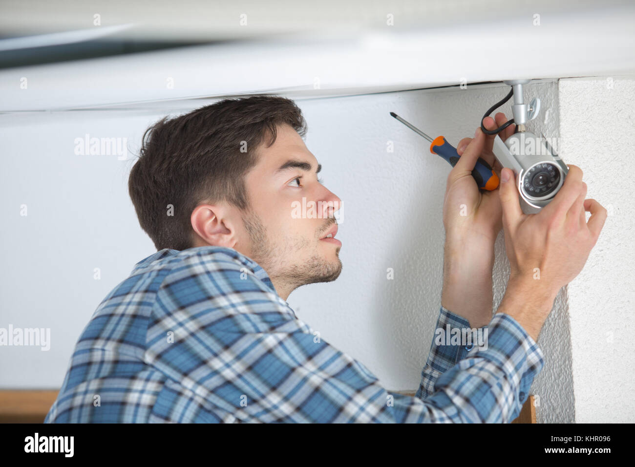 Installing surveillance camera hi-res stock photography and images - Alamy