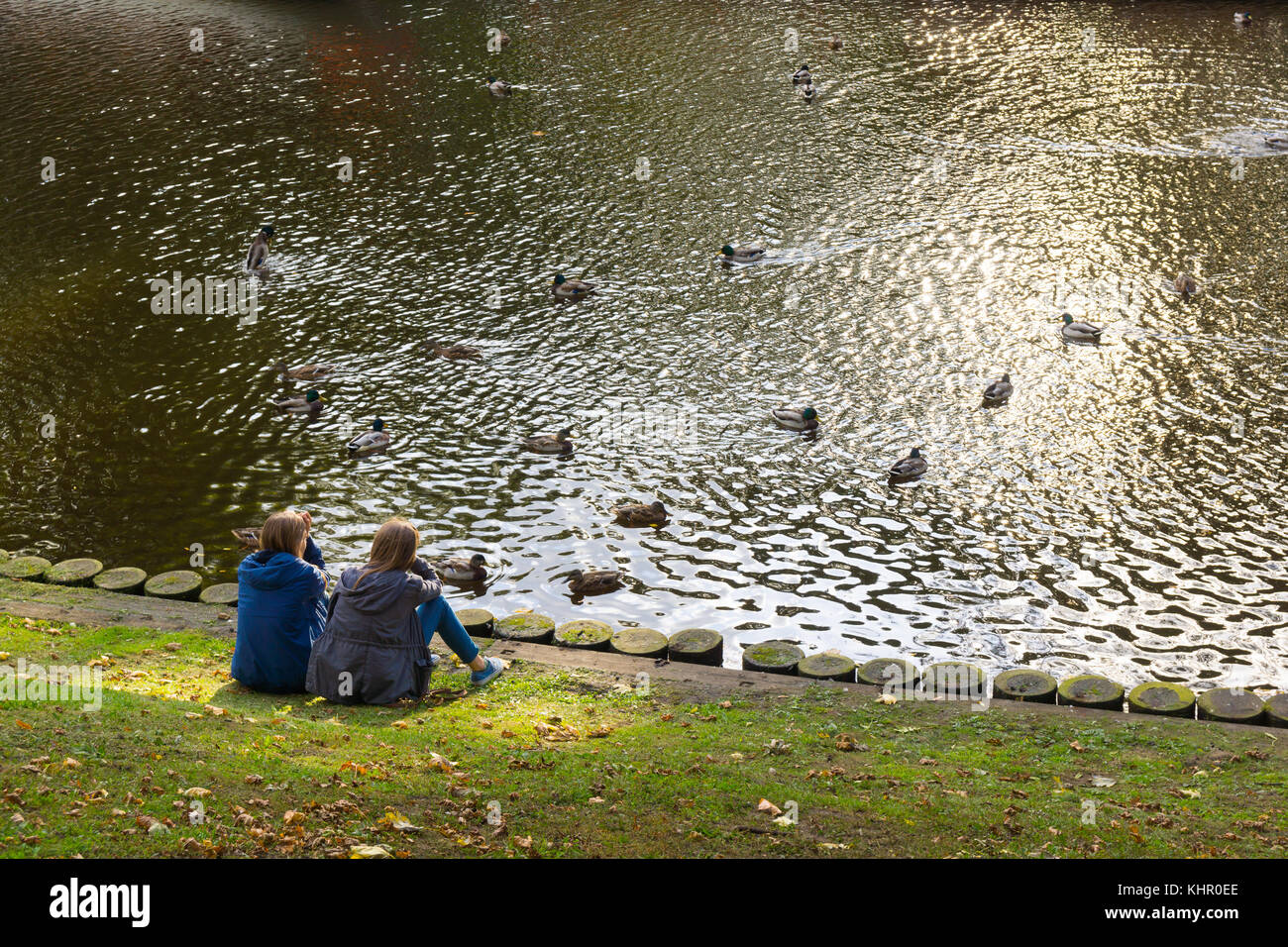 Two girls by the pond hi-res stock photography and images - Alamy