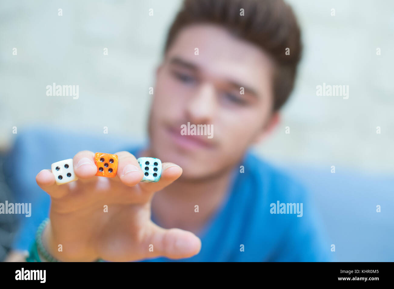 Dice Between Fingers High Resolution Stock Photography and Images - Alamy