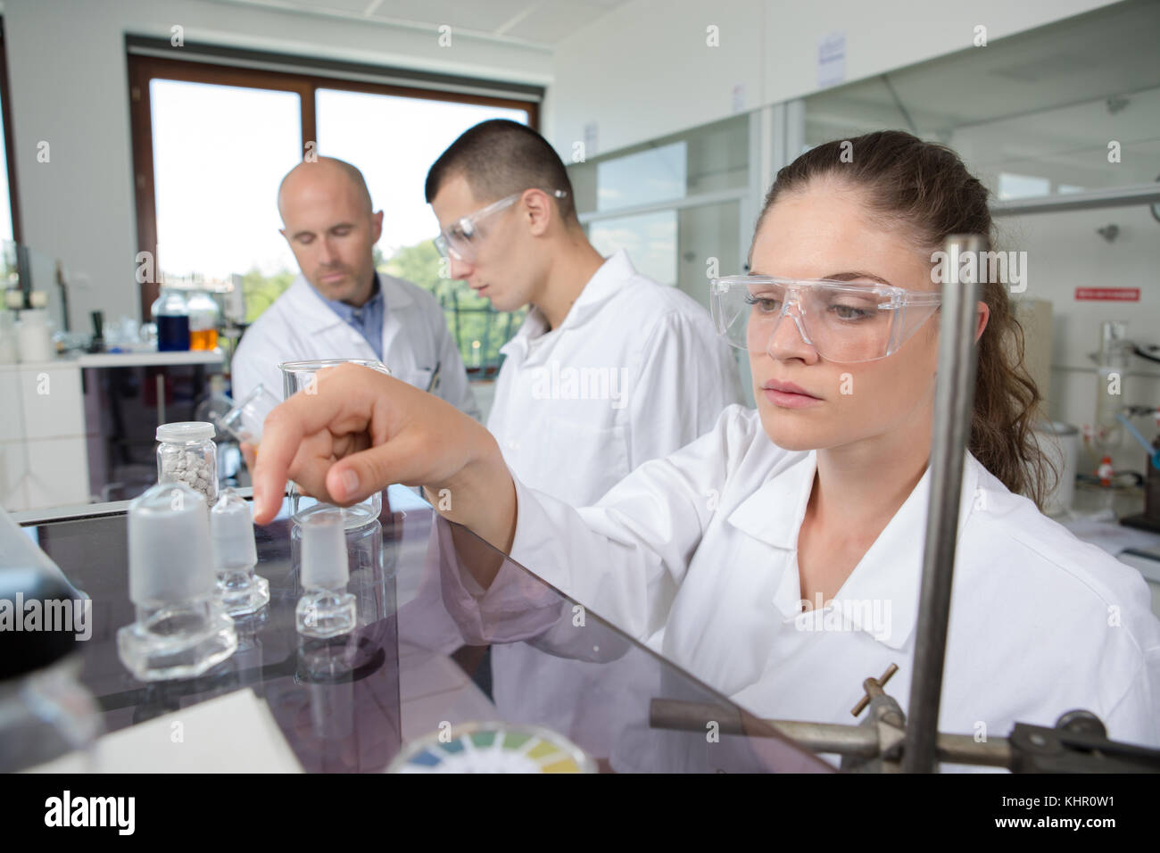 Science student working in lab Stock Photo - Alamy