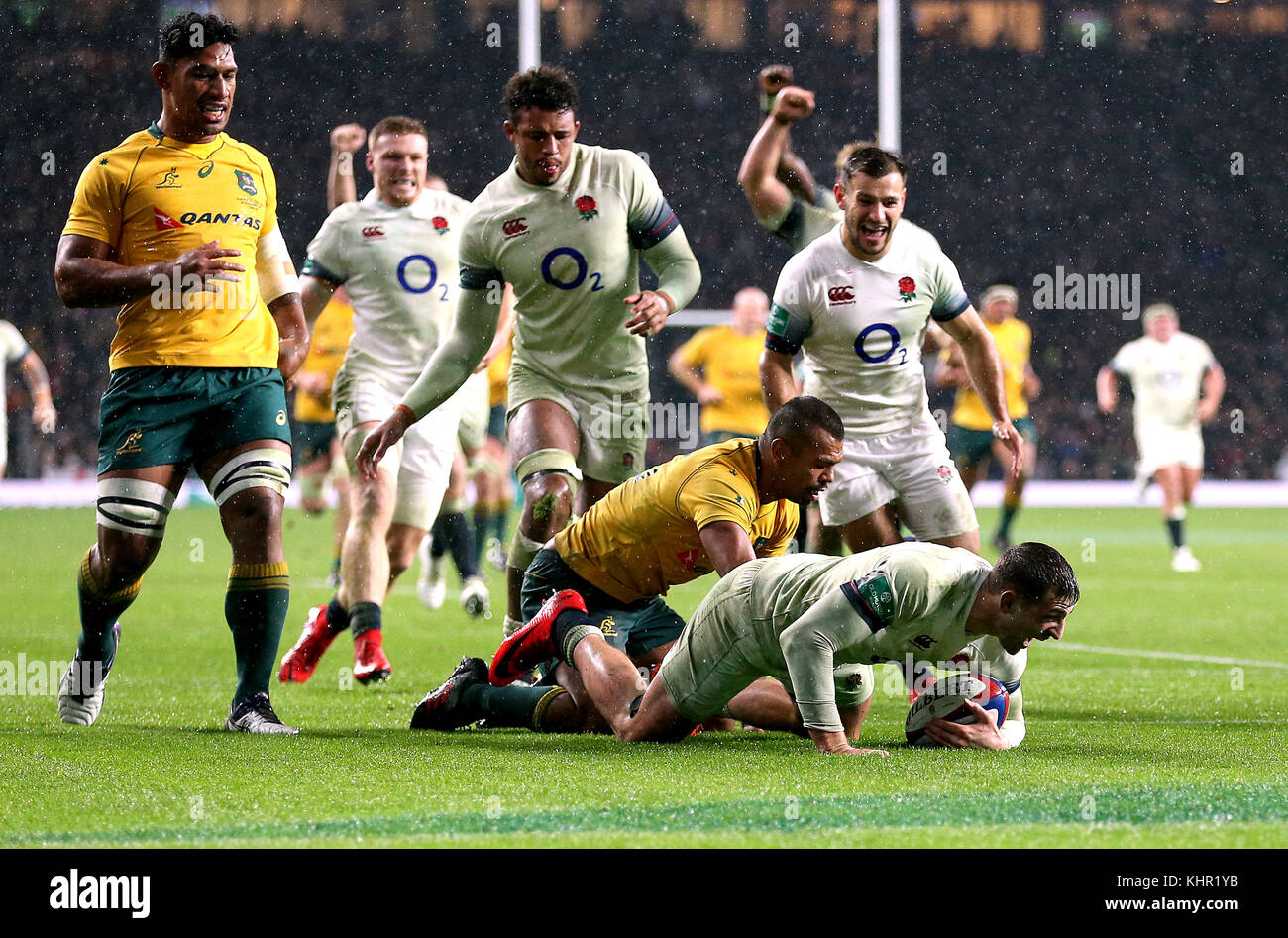 England's Jonny May scores his side's third try during the Autumn ...