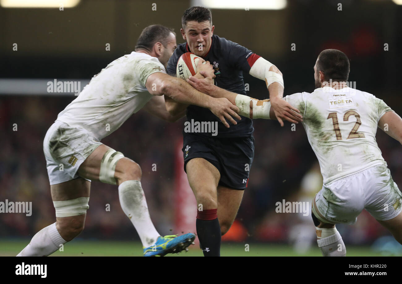 Wales Owen Watkins is tackled by Georgia's Giorgi Nemsadze and Merab ...