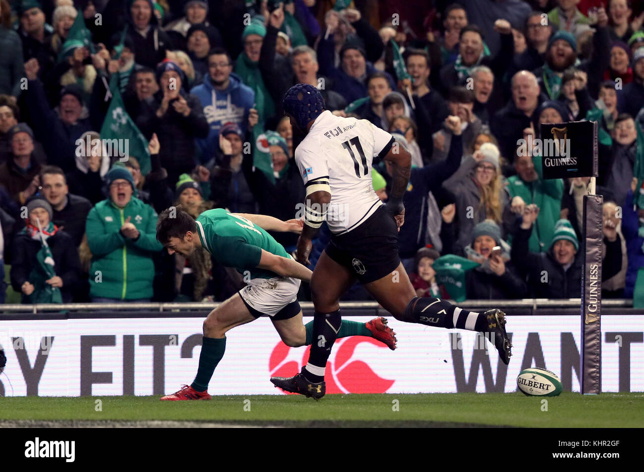 Ireland's Darren Sweetnam goes through the score his side's first try ...