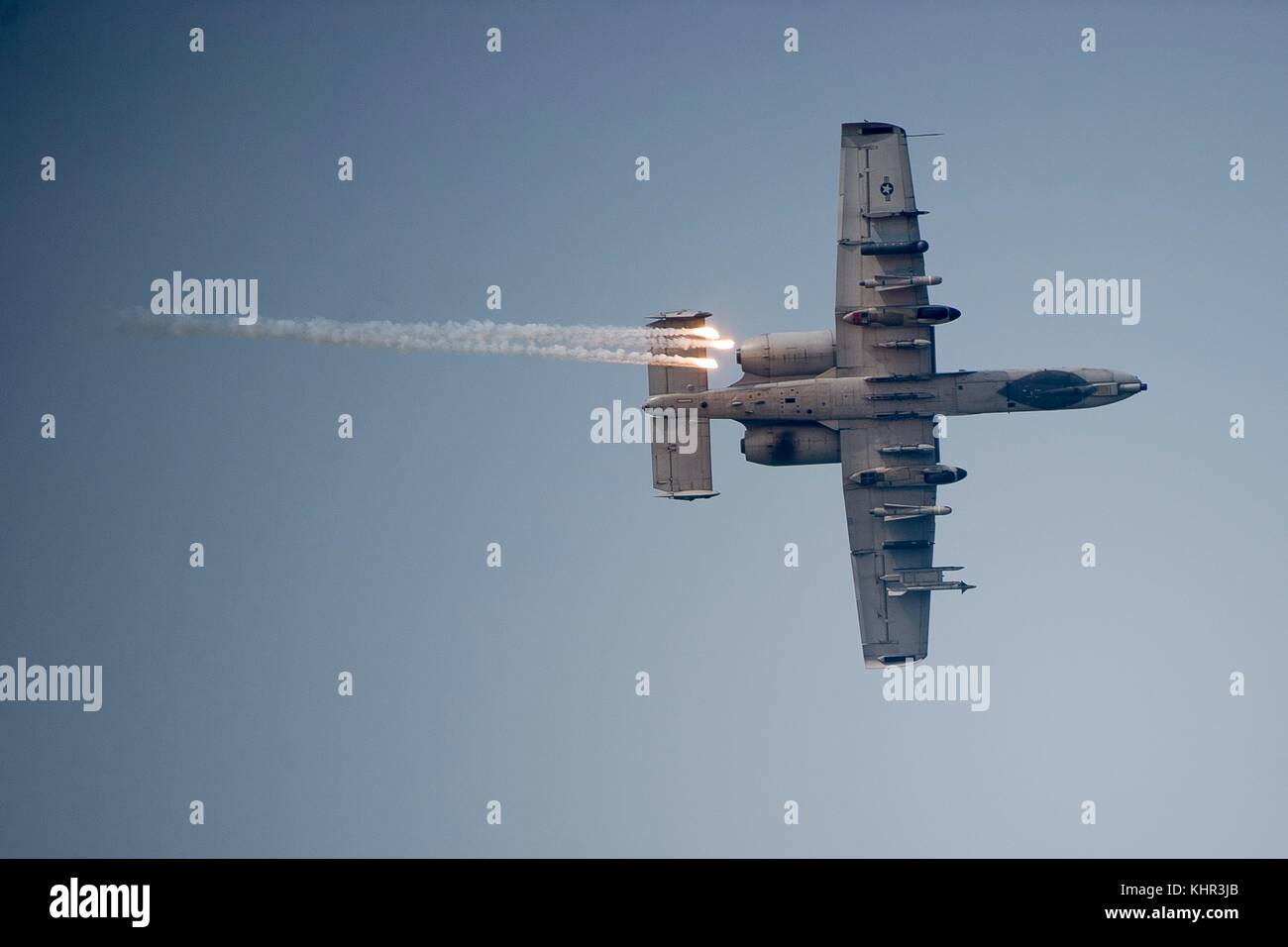 A U.S. Air Force A-10 Thunderbolt II jet aircraft shoots a flare while ...