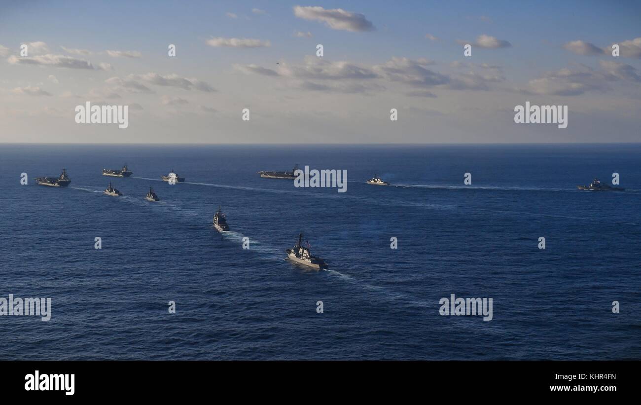 U.S. Navy and Japanese Self-Defense Force ships steam in formation ...