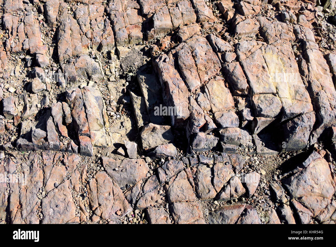 A rough red rock face texture Stock Photo - Alamy