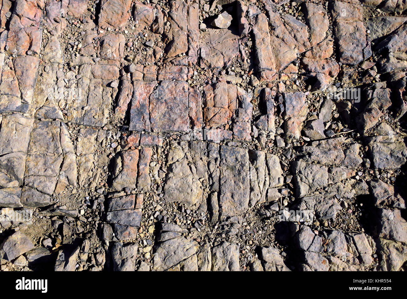 A rough red rock face texture Stock Photo - Alamy