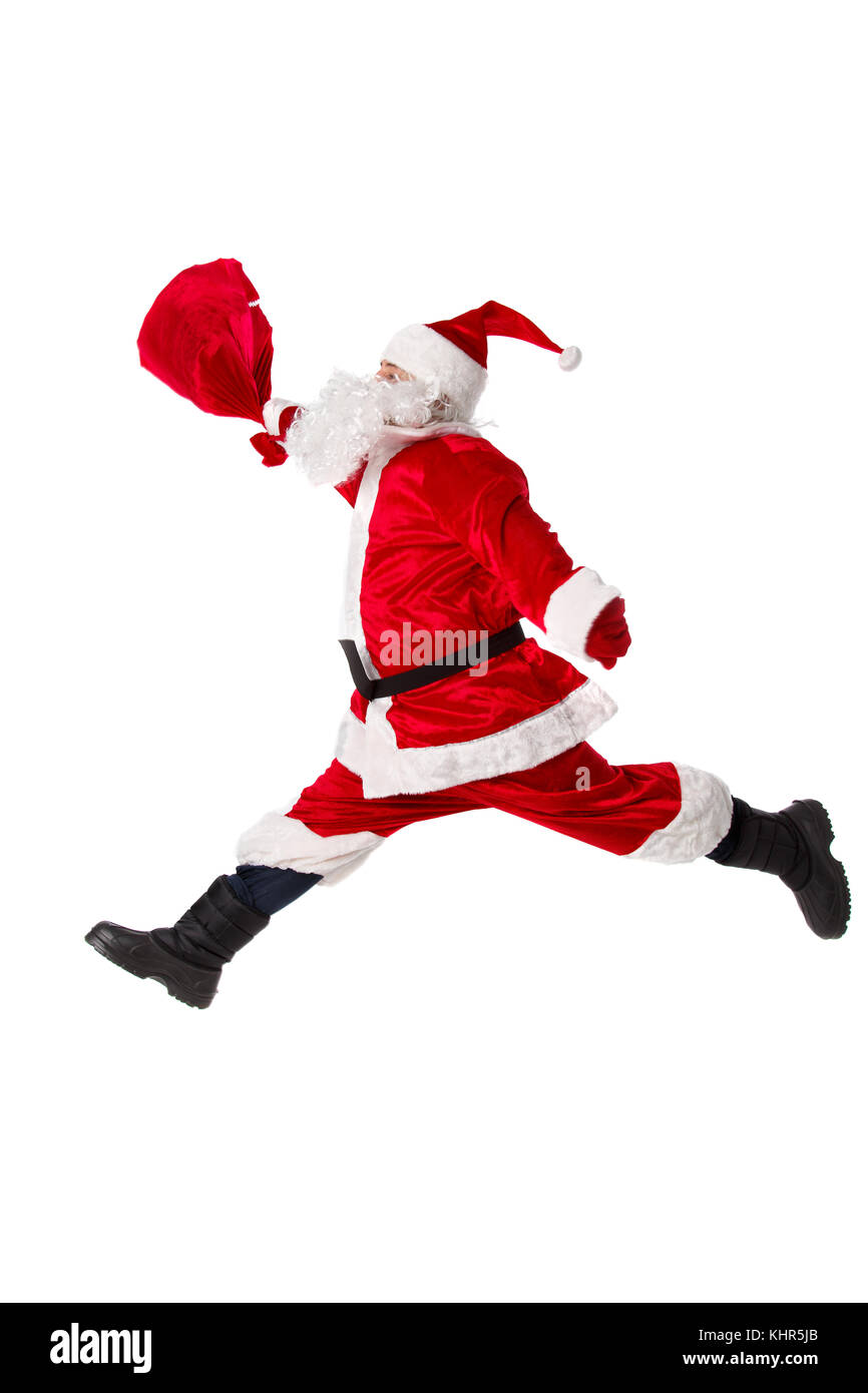 Santa Claus is jumping. Isolated on white. Authentic Santa Claus Stock ...