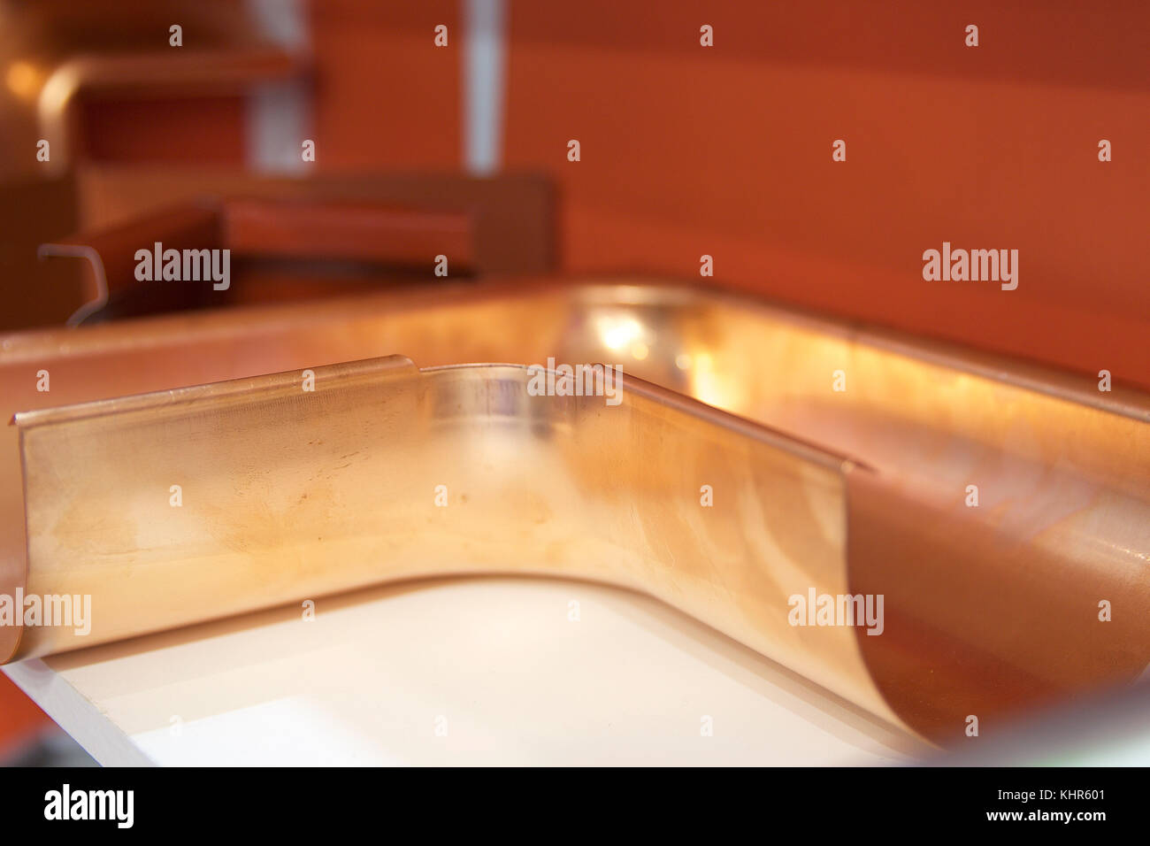 Bent copper profile for drainage system, element Stock Photo - Alamy