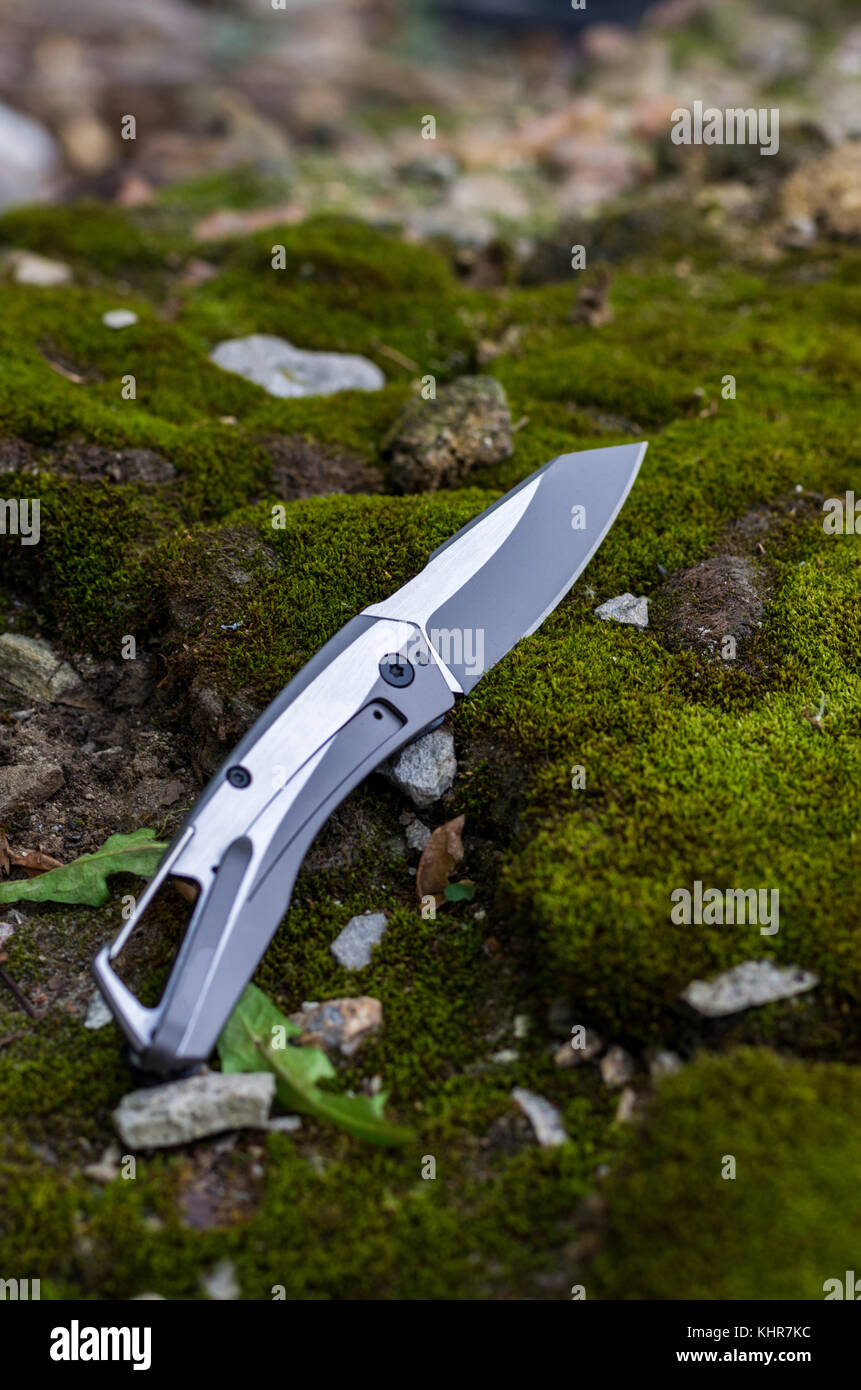 Folding knife for daily carrying. Vertical frame Stock Photo - Alamy