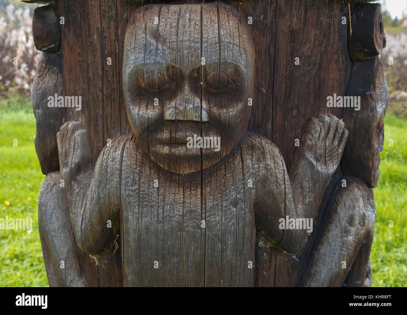 "Wooden totem pole showing child, Kispiox, British Columbia, Canada ...