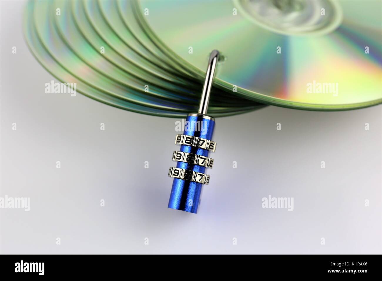 An concept Image of a cd and a lock - data security Stock Photo - Alamy
