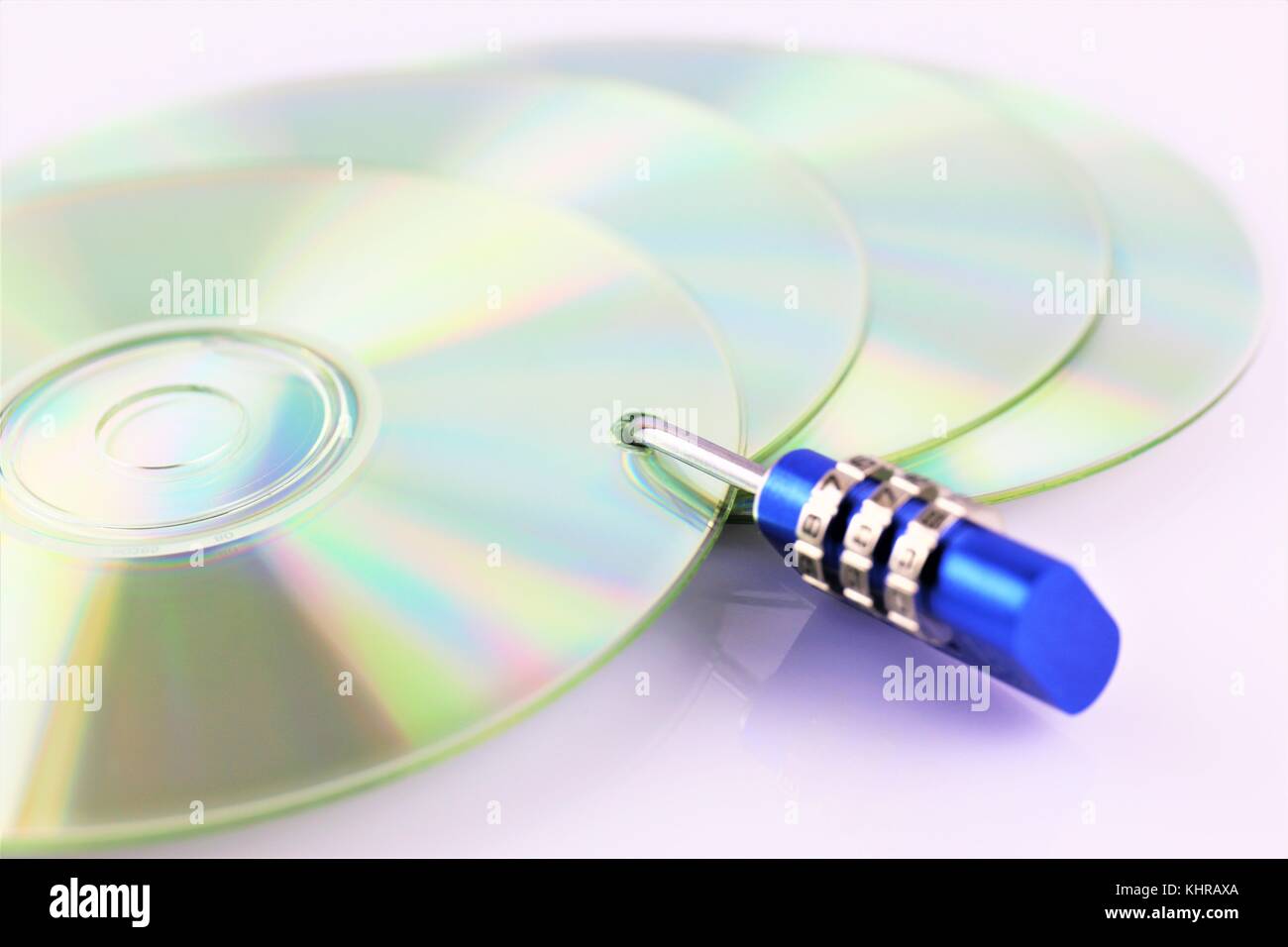 An concept Image of a cd and a lock - data security Stock Photo - Alamy