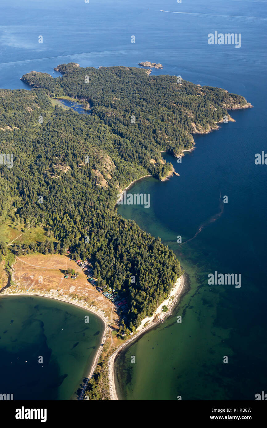 Sandy Beach and cabines on Thormanby Island near Sunshine Coast ...