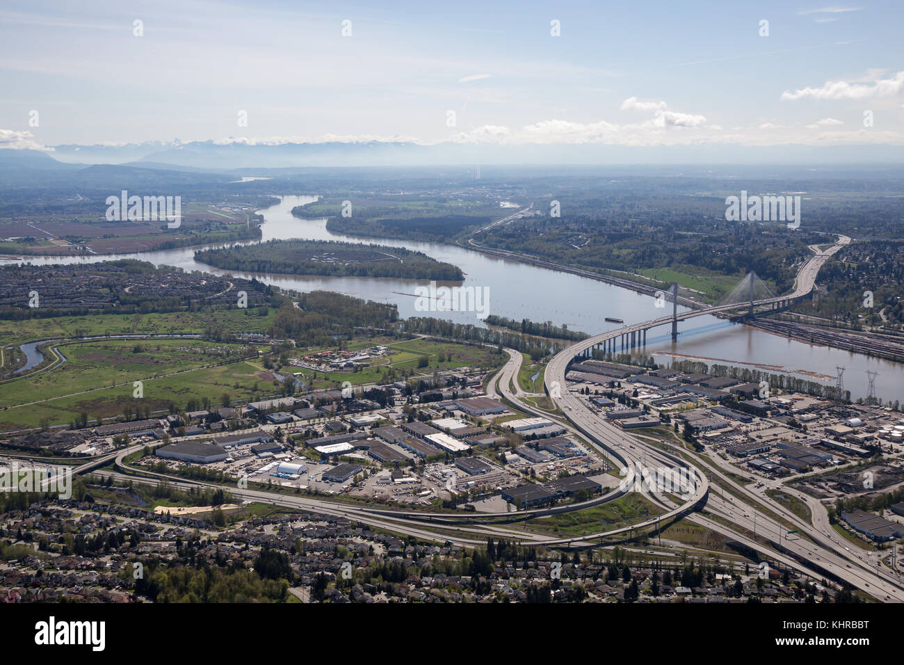 Aerial view of Port Mann Bridge over Fraser River. Taken in Greater ...