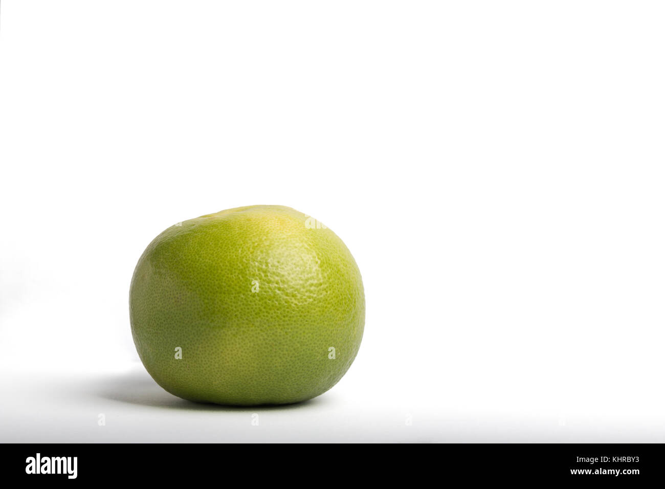 sweetie grapefruit isolated on a white background Stock Photo - Alamy