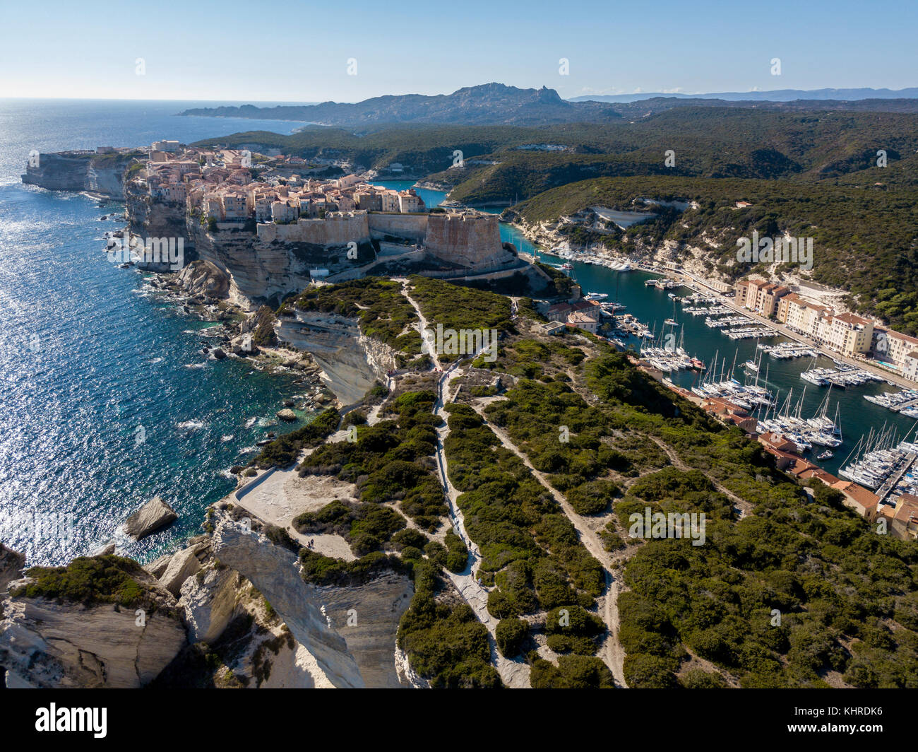 Aerial view of Bonifacio old town built on cliffs of white limestone ...