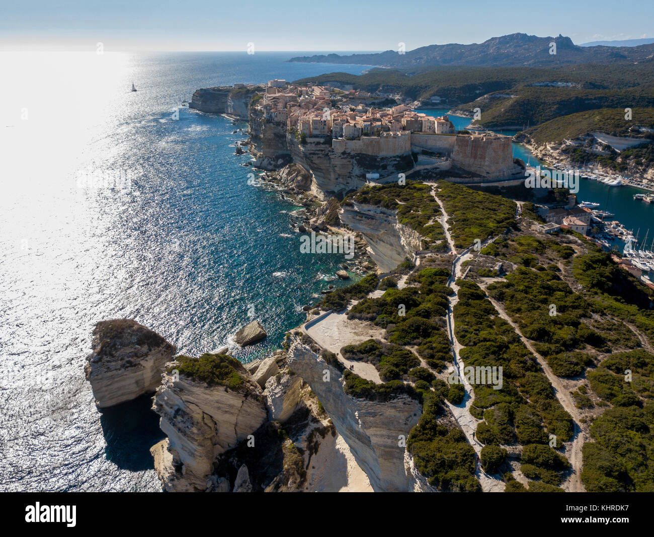 Aerial view of Bonifacio old town built on cliffs of white limestone ...