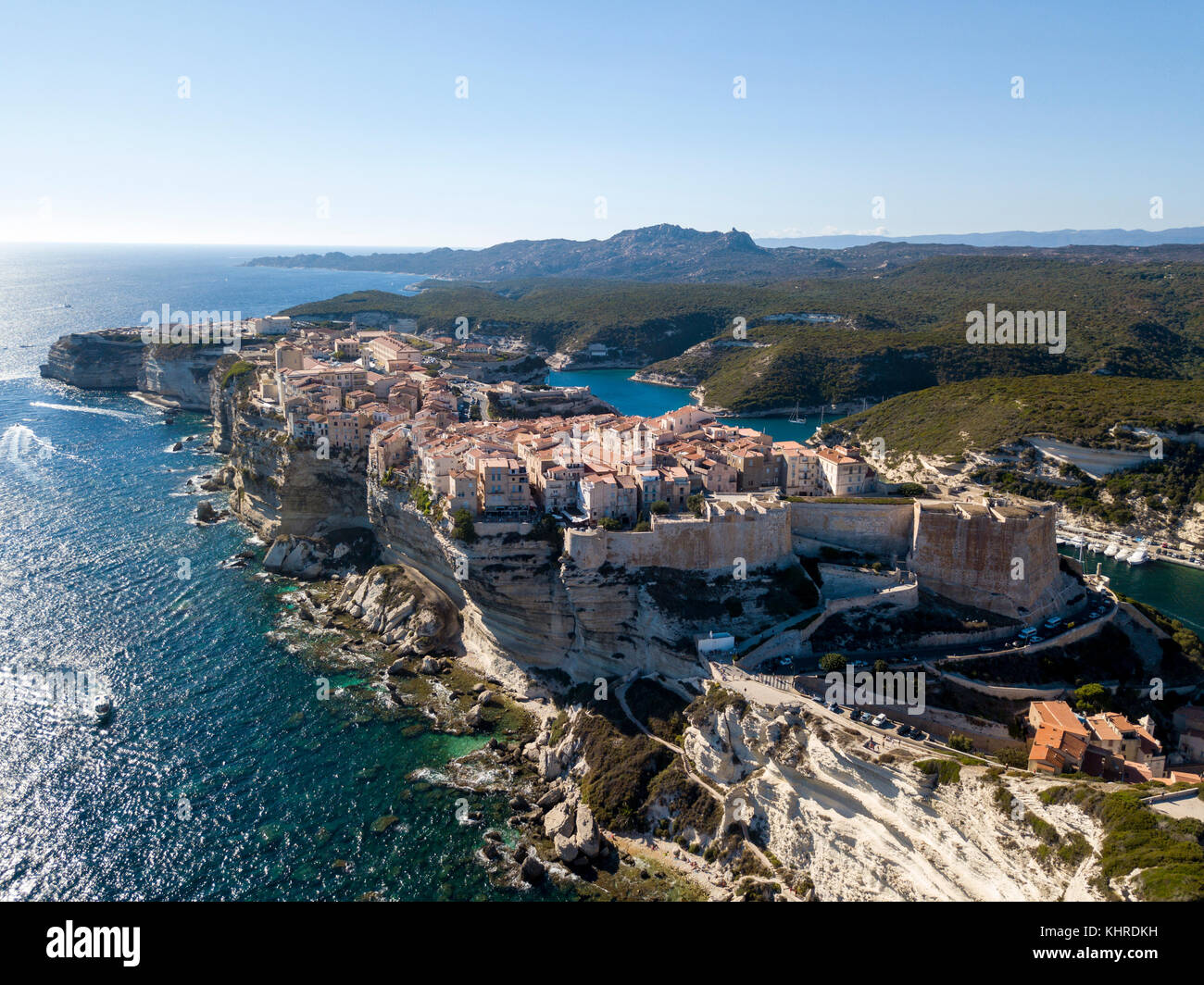 Aerial view of Bonifacio old town built on cliffs of white limestone ...