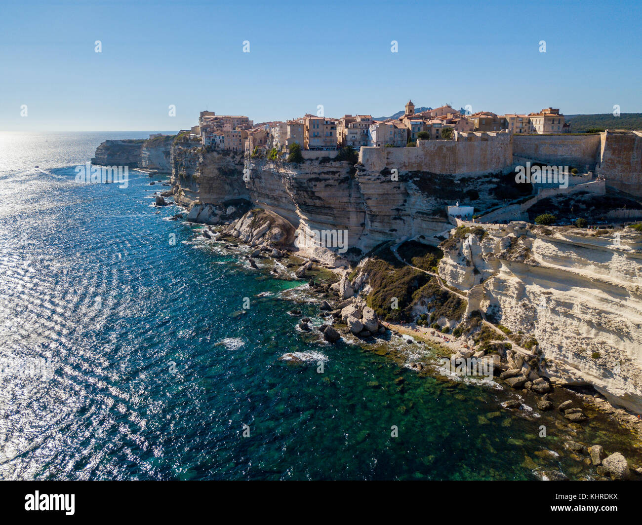 Aerial view of Bonifacio old town built on cliffs of white limestone ...