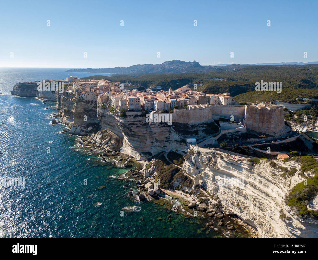 Aerial view of Bonifacio old town built on cliffs of white limestone ...