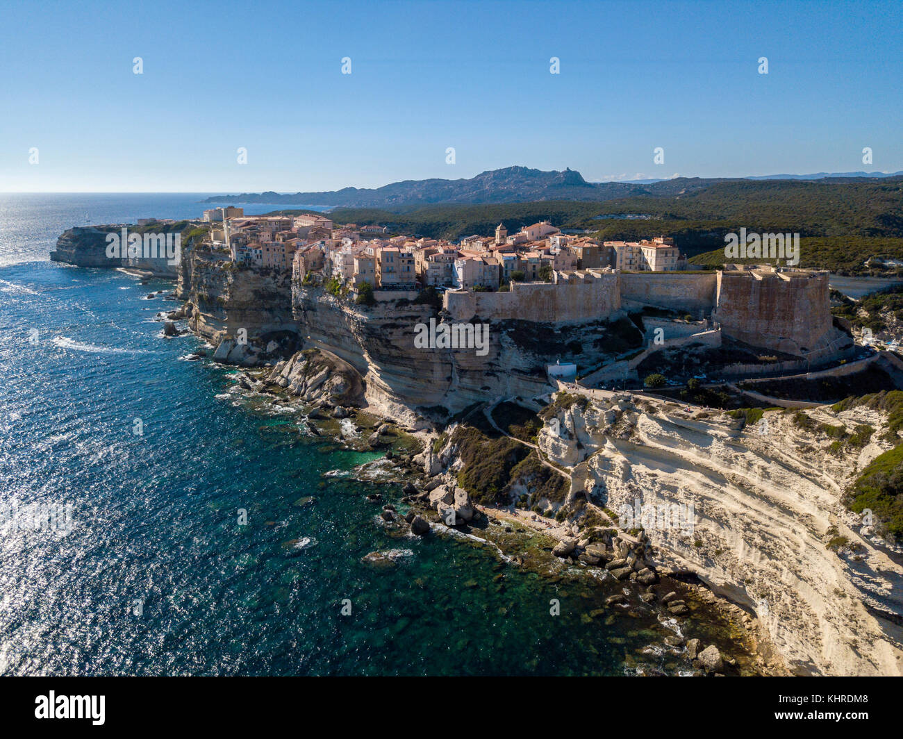 Aerial view of Bonifacio old town built on cliffs of white limestone ...