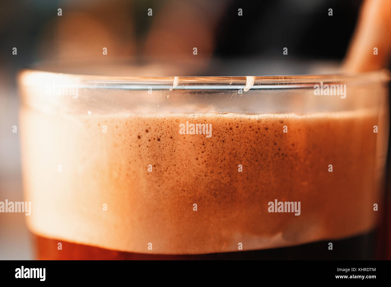 Iced Coffee In Tall Glass With Foam And Bubbles Stock Photo - Alamy