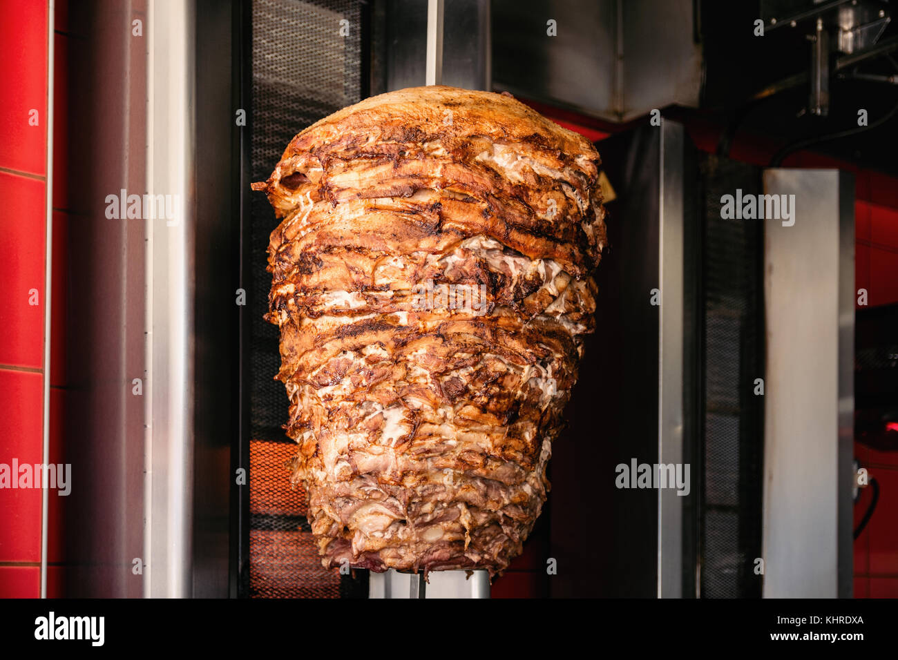 Doner Kebab On Rotating Vertical Spit Stock Photo - Alamy