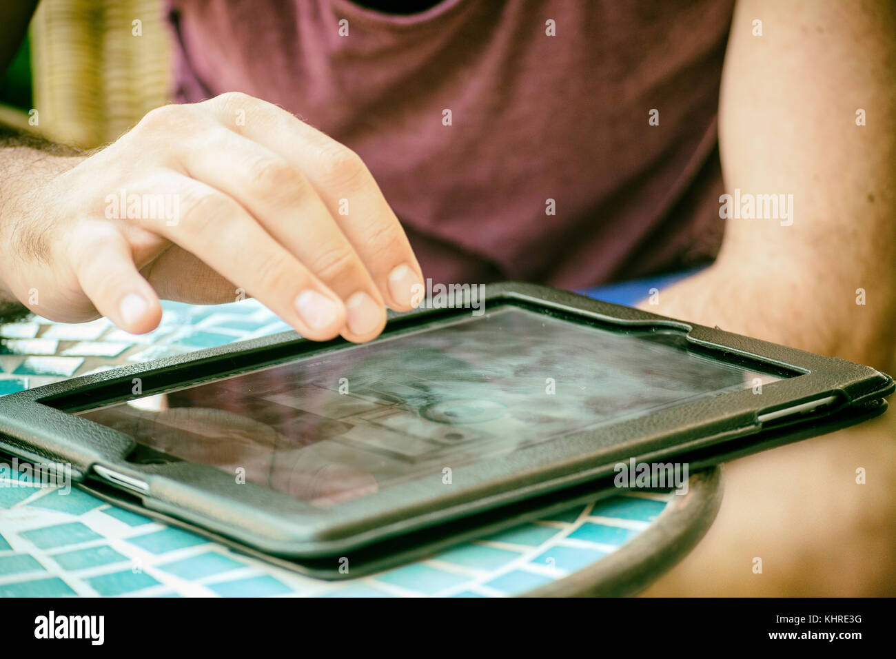 Man using tablet - young people working at home. © Antonio Ciufo Stock ...