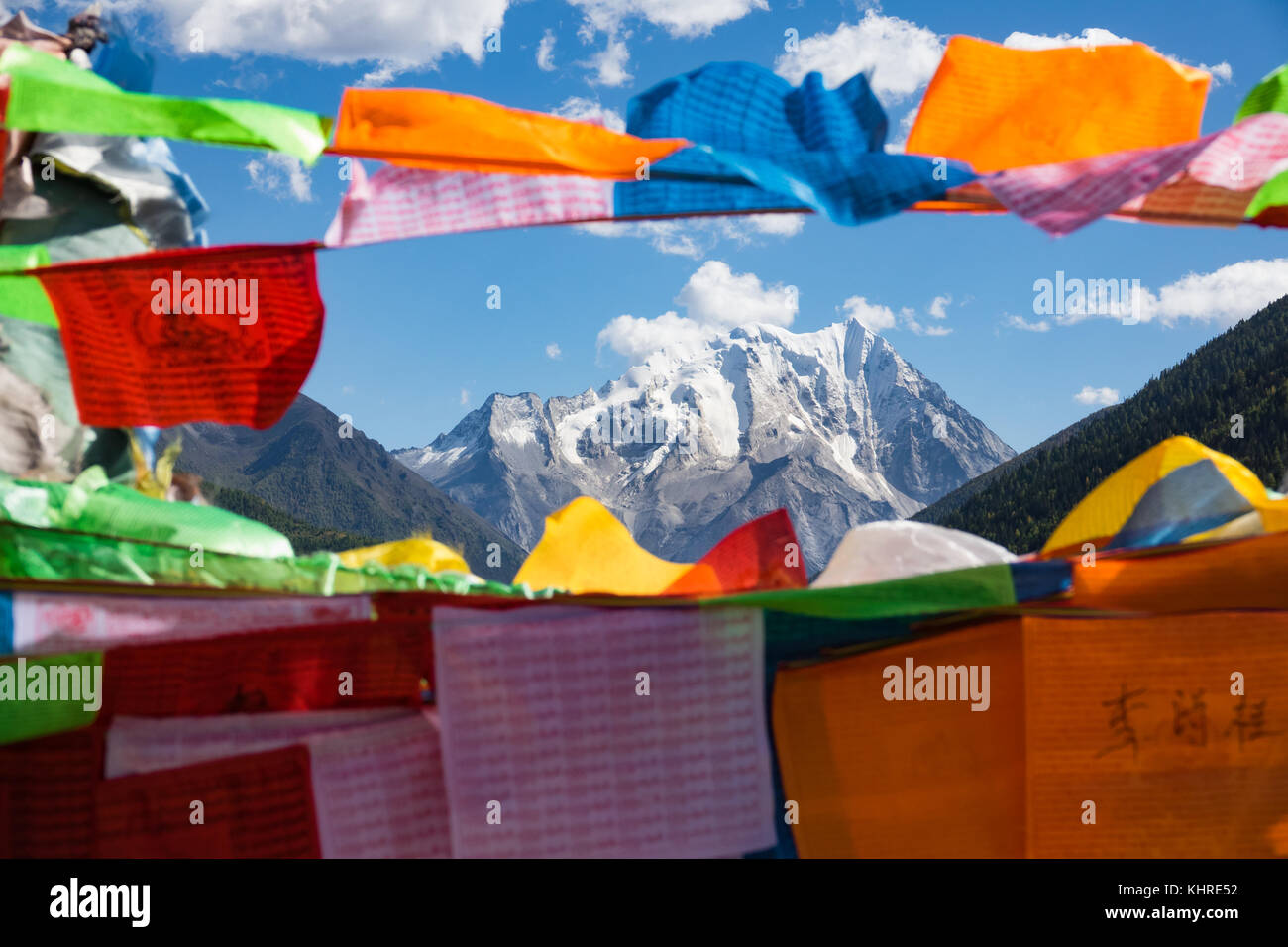 Yala snow mountain with prayer flags - Sichuan ,China Stock Photo - Alamy