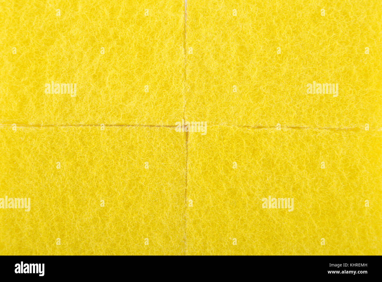 Yellow texture cellulose foam sponge. Background Stock Photo - Alamy