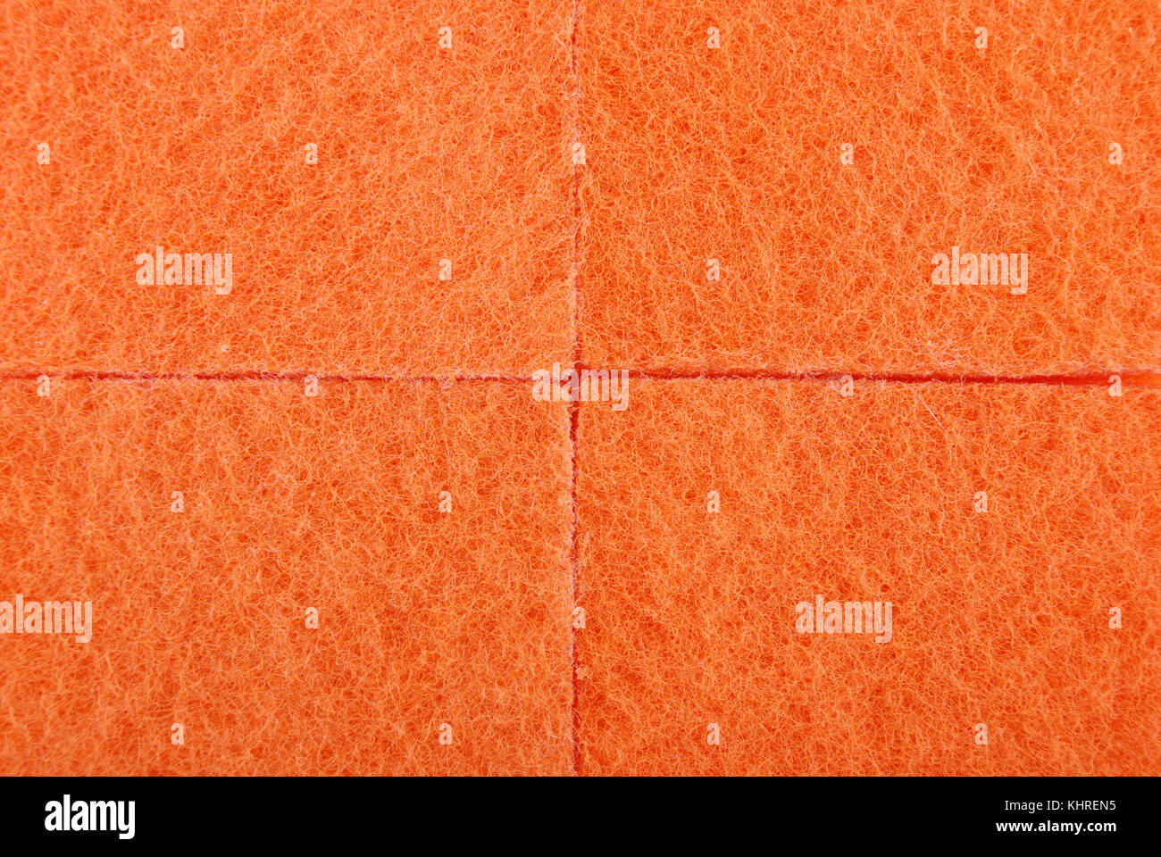 Orange texture cellulose foam sponge. Background Stock Photo - Alamy