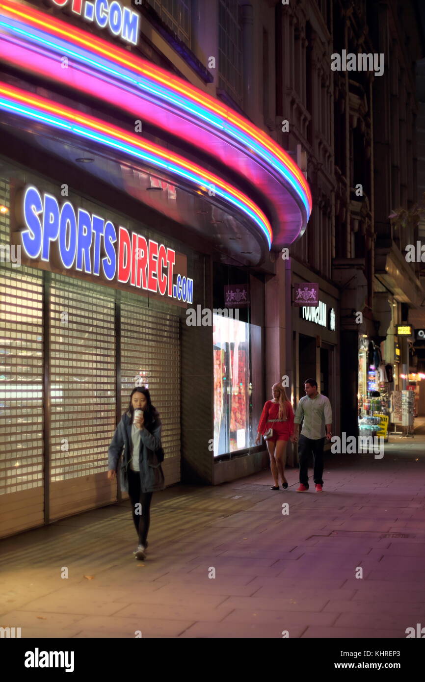 SPORTS DIRECT. Store at night with shutters down on Oxford street ...