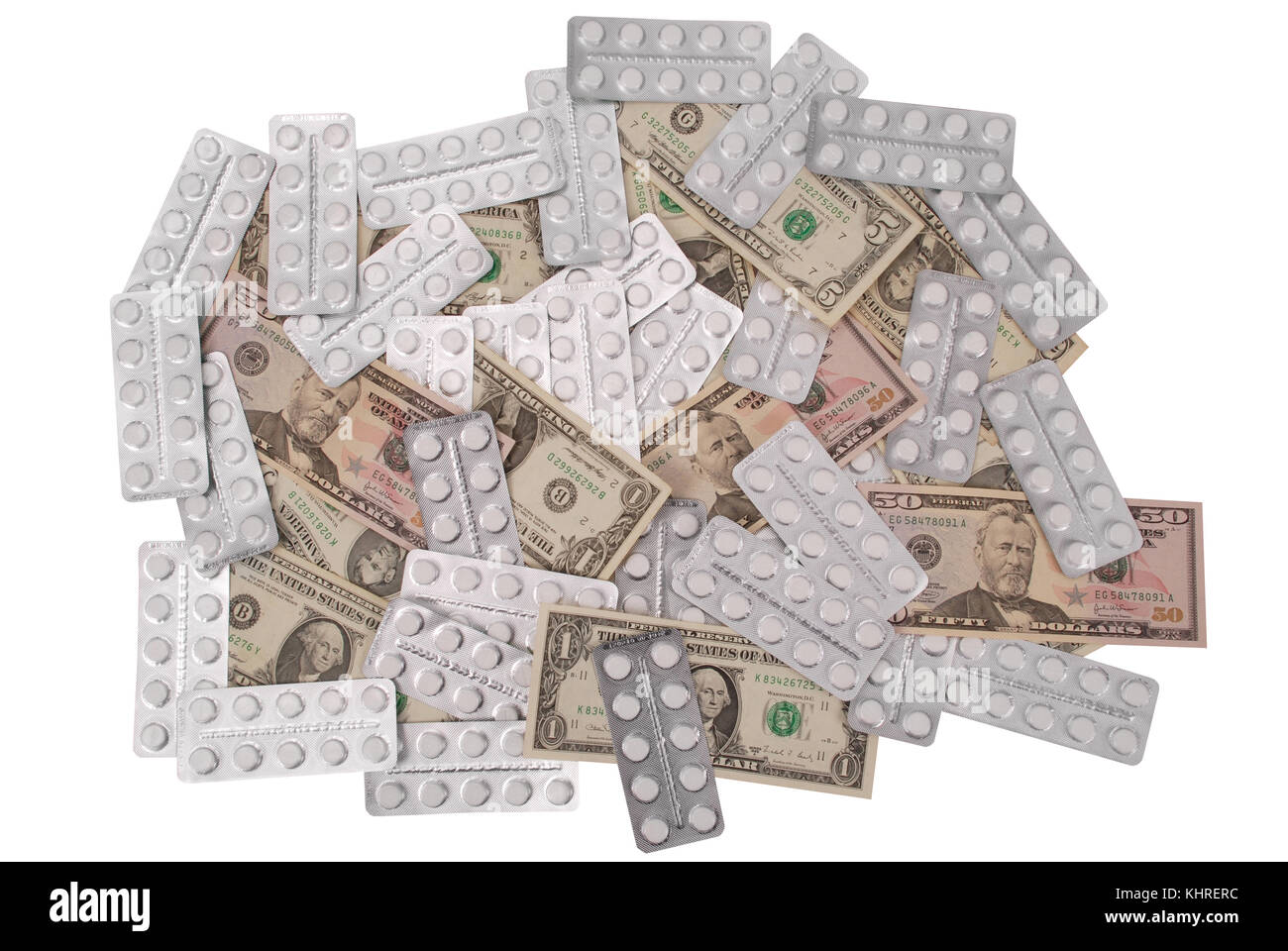 Dollars and tablets alternately on a white background Stock Photo - Alamy