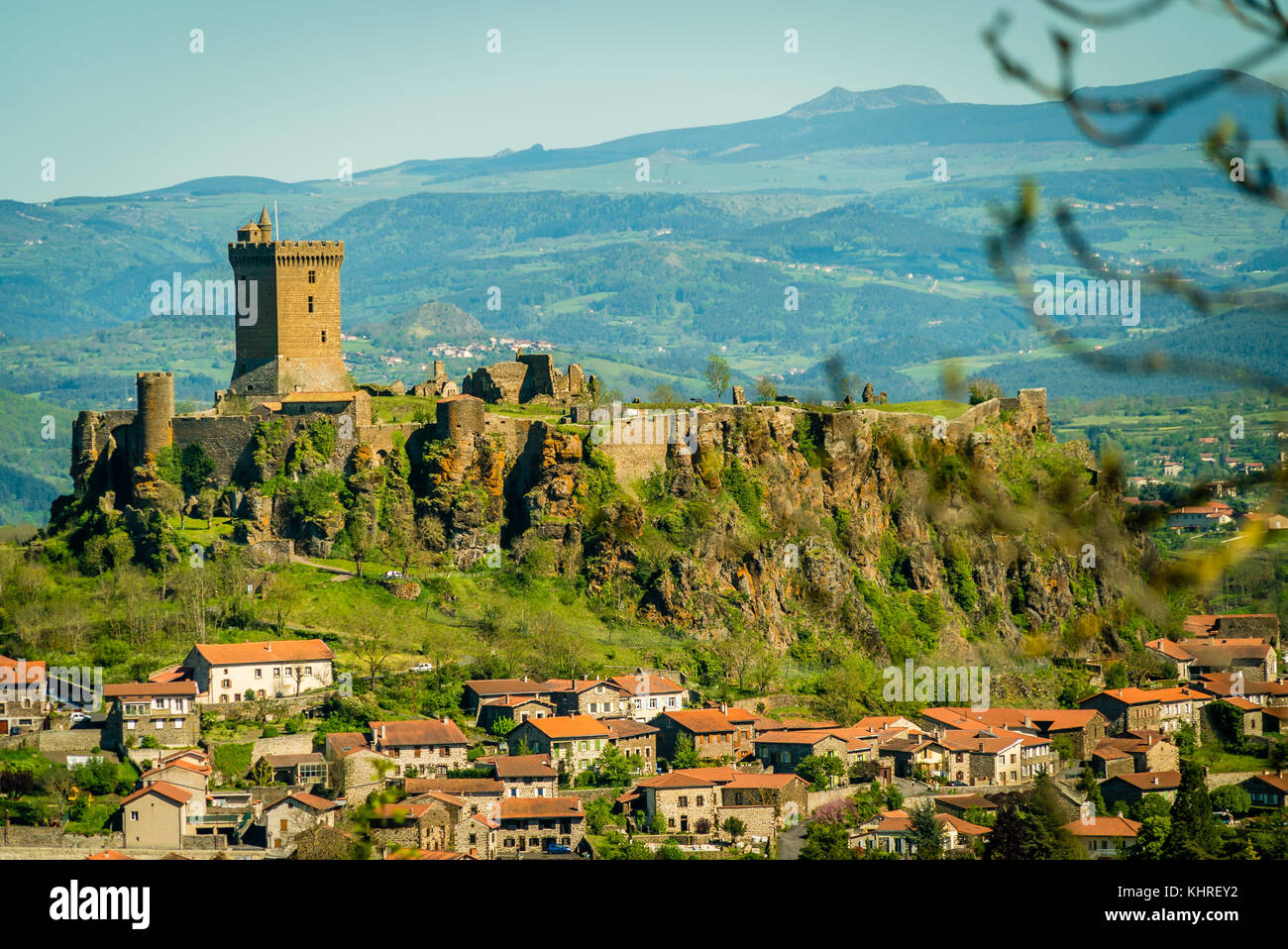 Old castle on a hill with the village at the bottom of the hill Stock ...