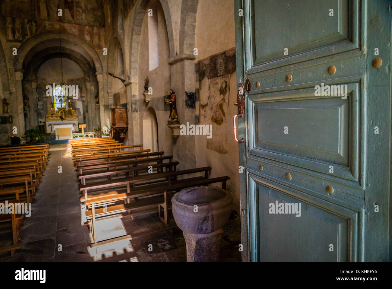 Open church door and church interior in France Stock Photo - Alamy