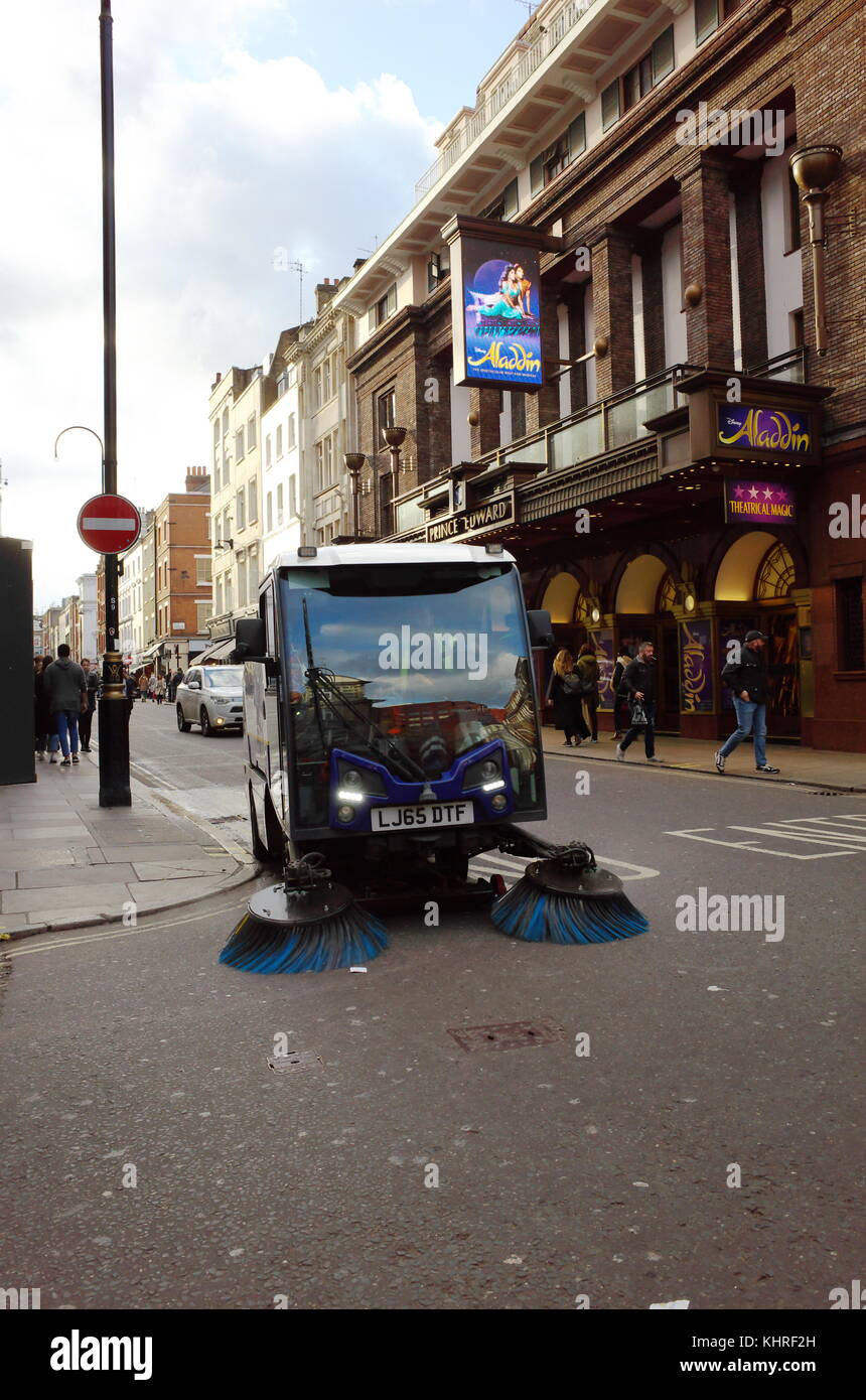 Compact road sweeping vehicle in Soho, London, England Stock Photo - Alamy