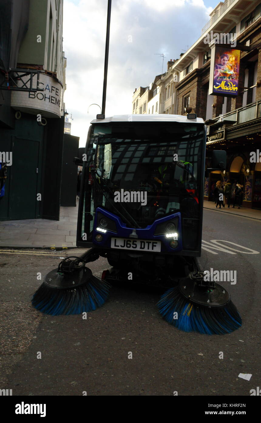 Compact road sweeping vehicle in Soho, London, England Stock Photo - Alamy