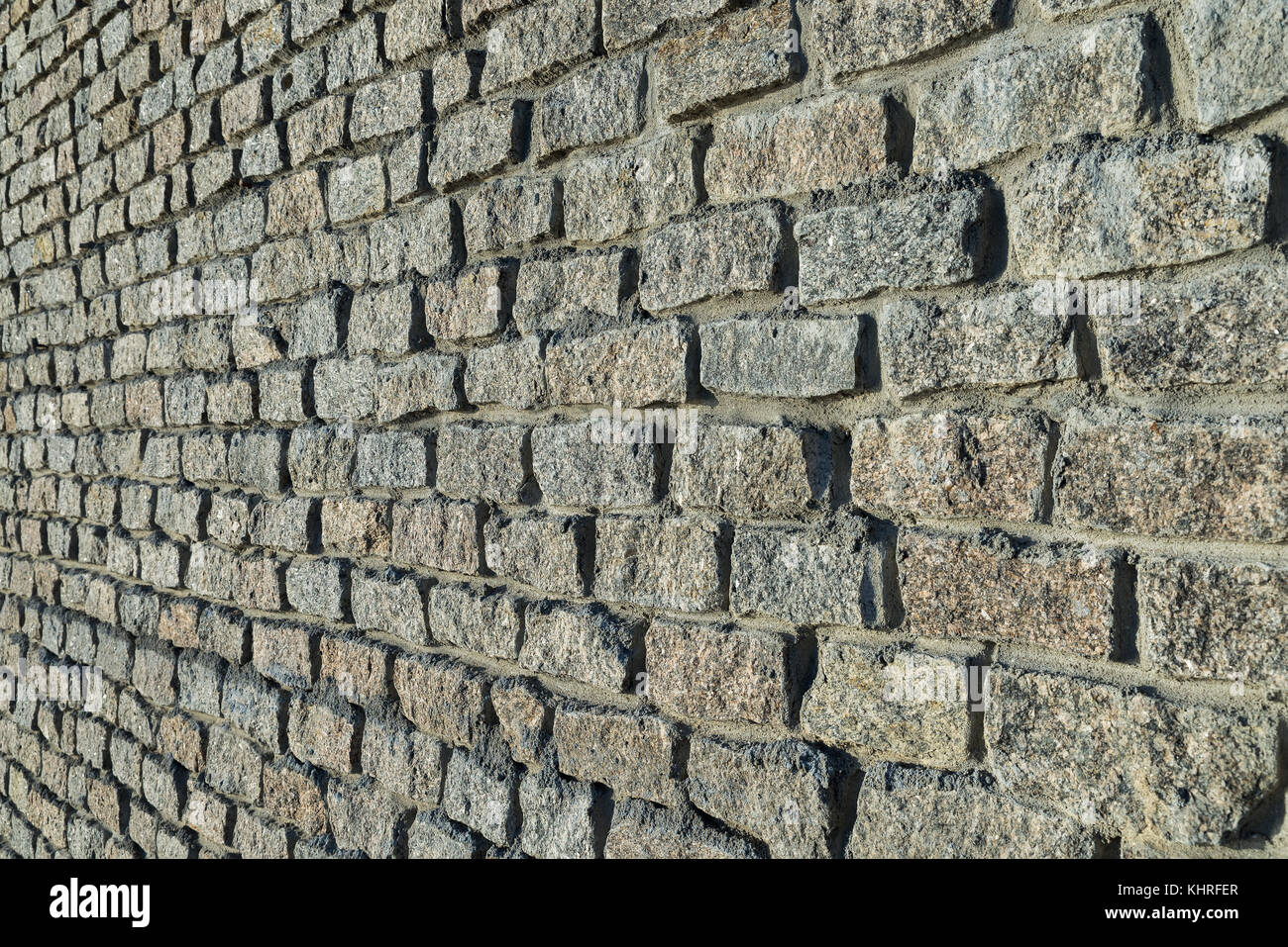 stones wall. granite bricks. soft focus Stock Photo - Alamy