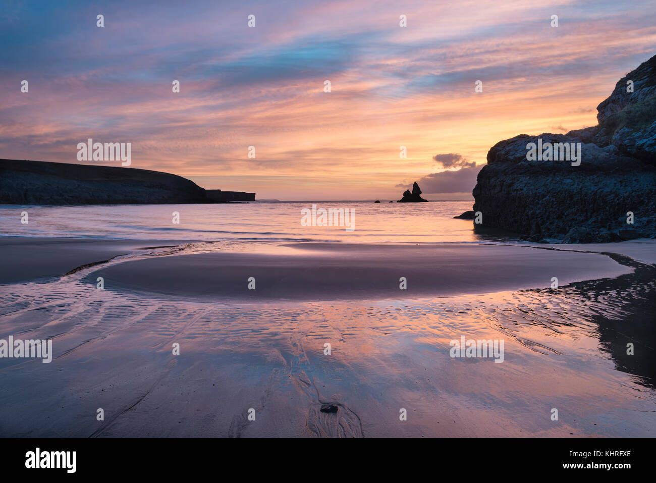 Stunning sunrise landsdcape of idyllic Broadhaven Bay beach on ...