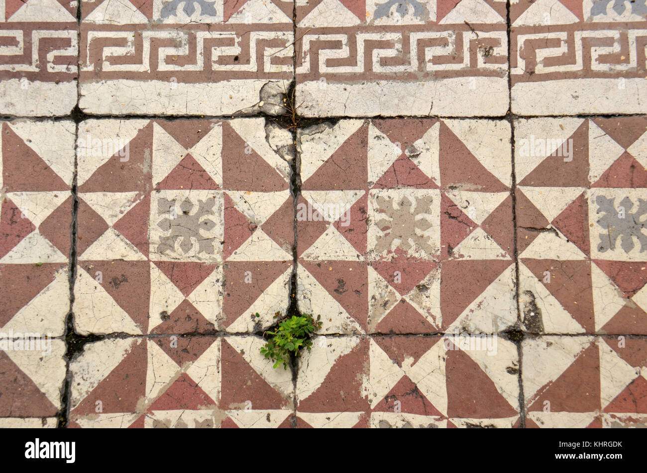 Walked on by thousands of feet but still colourful, these tiles mark a ...