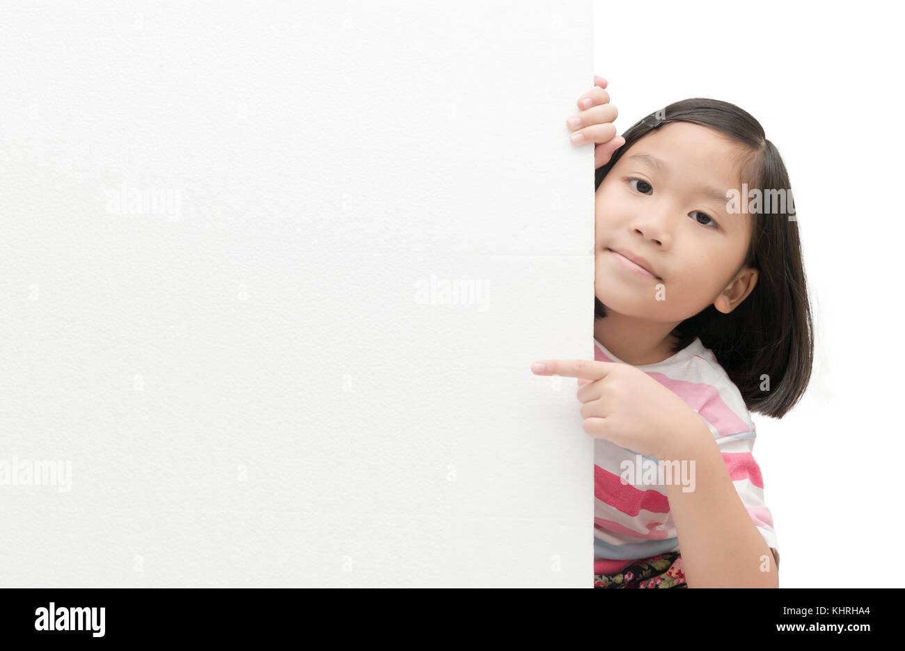 cute asian girl pointing on white banner board isolated on white ...