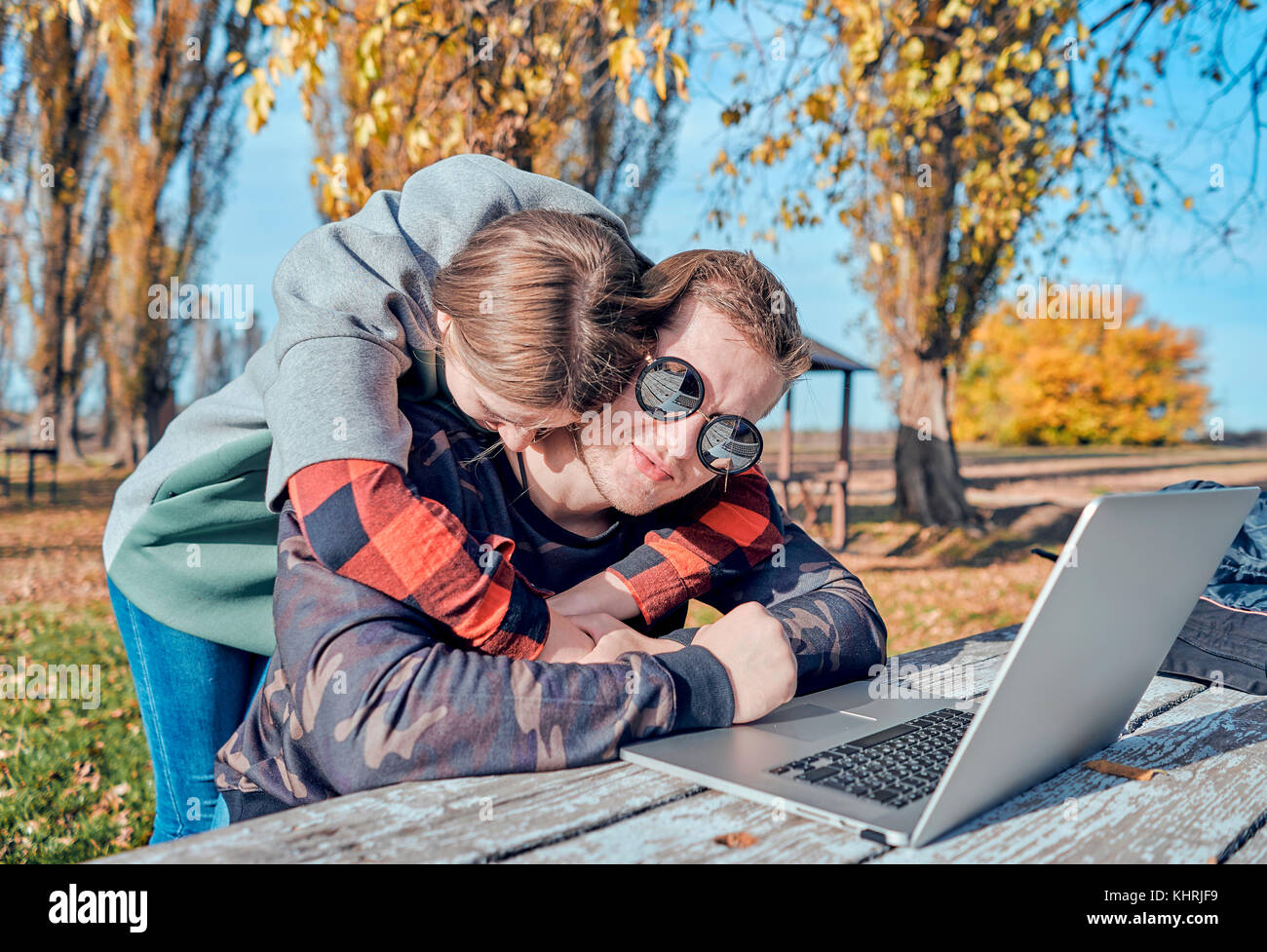 couple in nature with the computer Stock Photo - Alamy