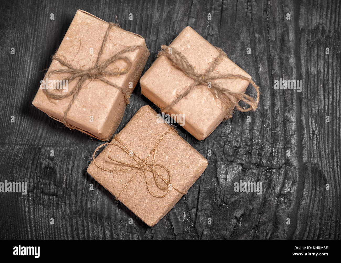 top view of paper boxes on black wooden background, close up, concept ...