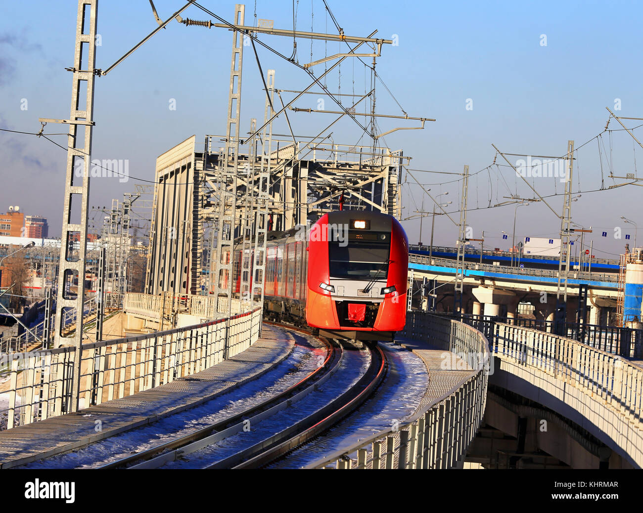 Passenger electric train at the coming to the railway station after ...