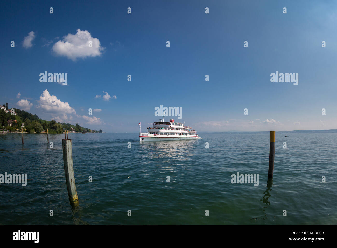 A passenger ferry runs to the port of Meersburg on Lake Constance Stock ...